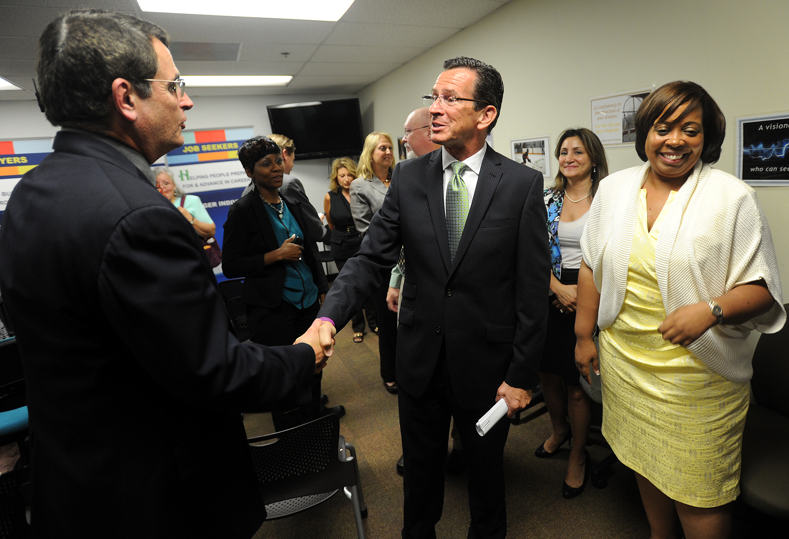 Malloy touts progress, Foley disagrees