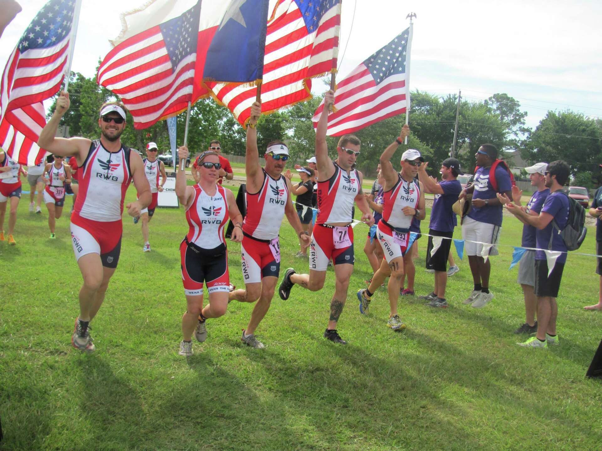 Triathletes help Rotary Club of Katy help others