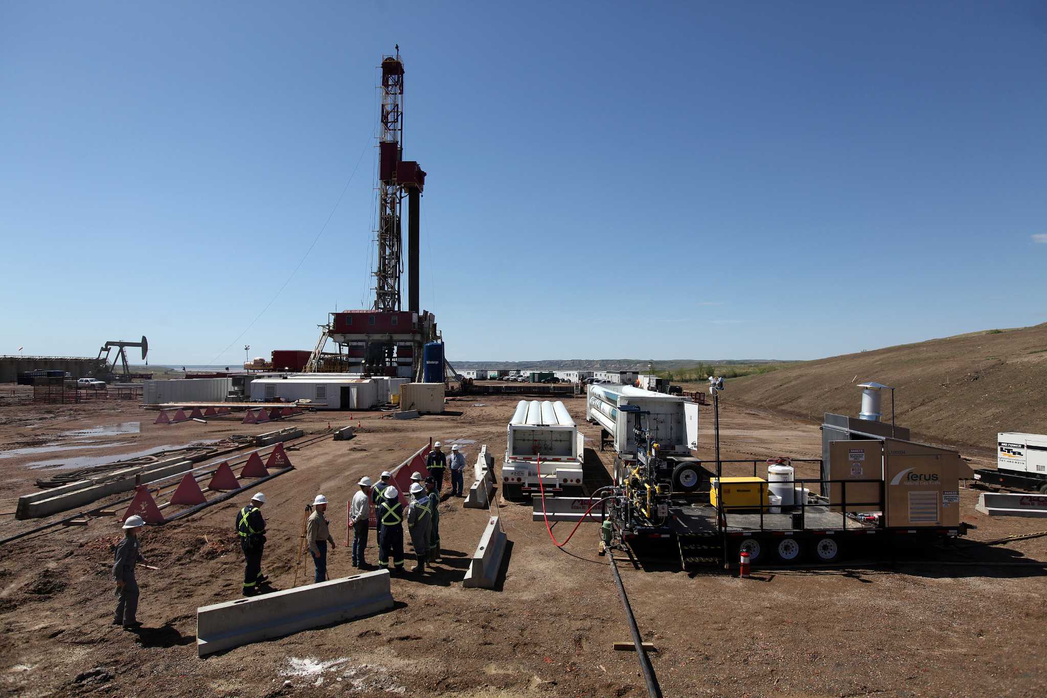 With natural gas to burn, drillers try using it to power rigs
