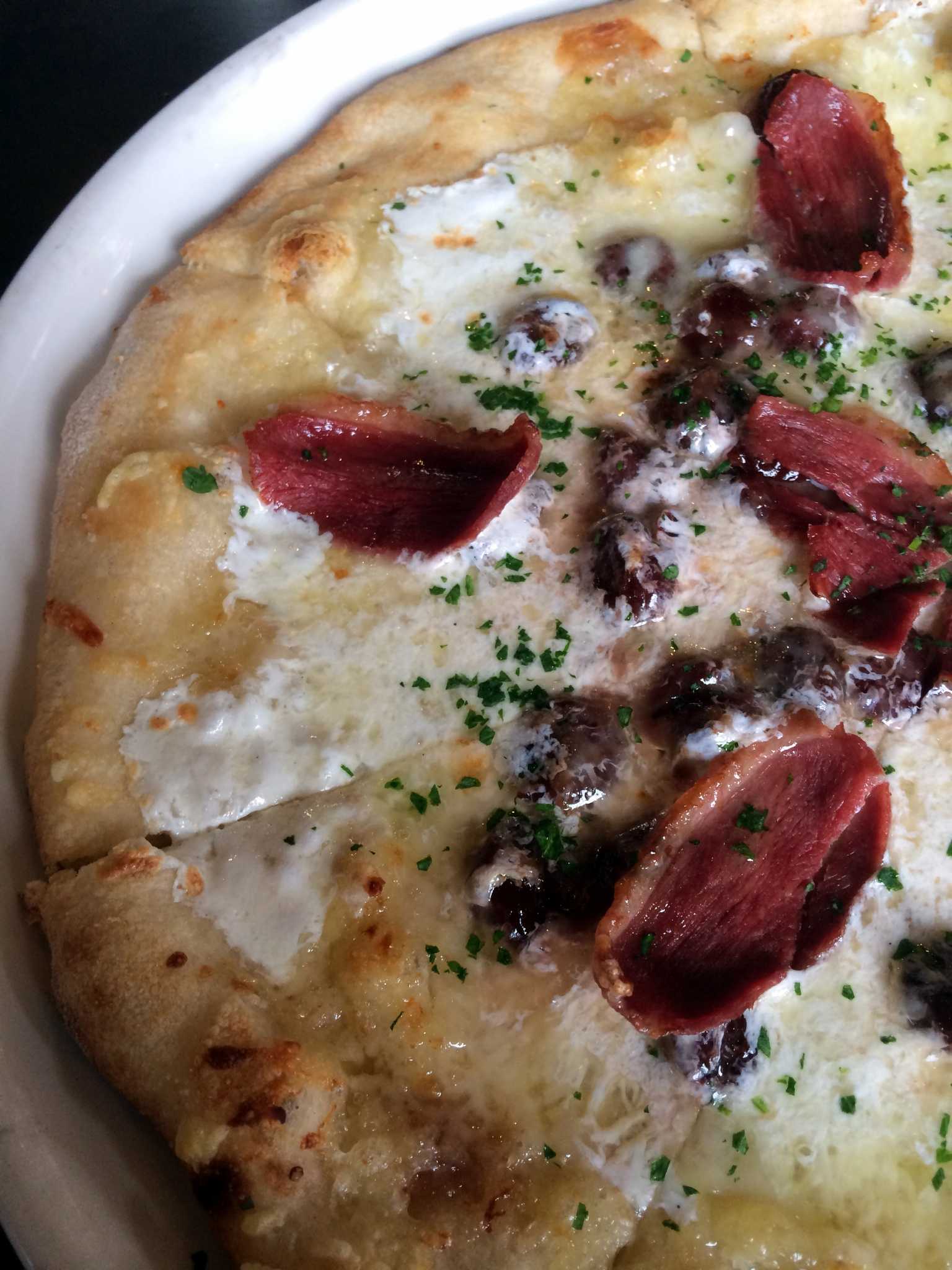 One great dish: smoked duck pizza at the Tasting Room
