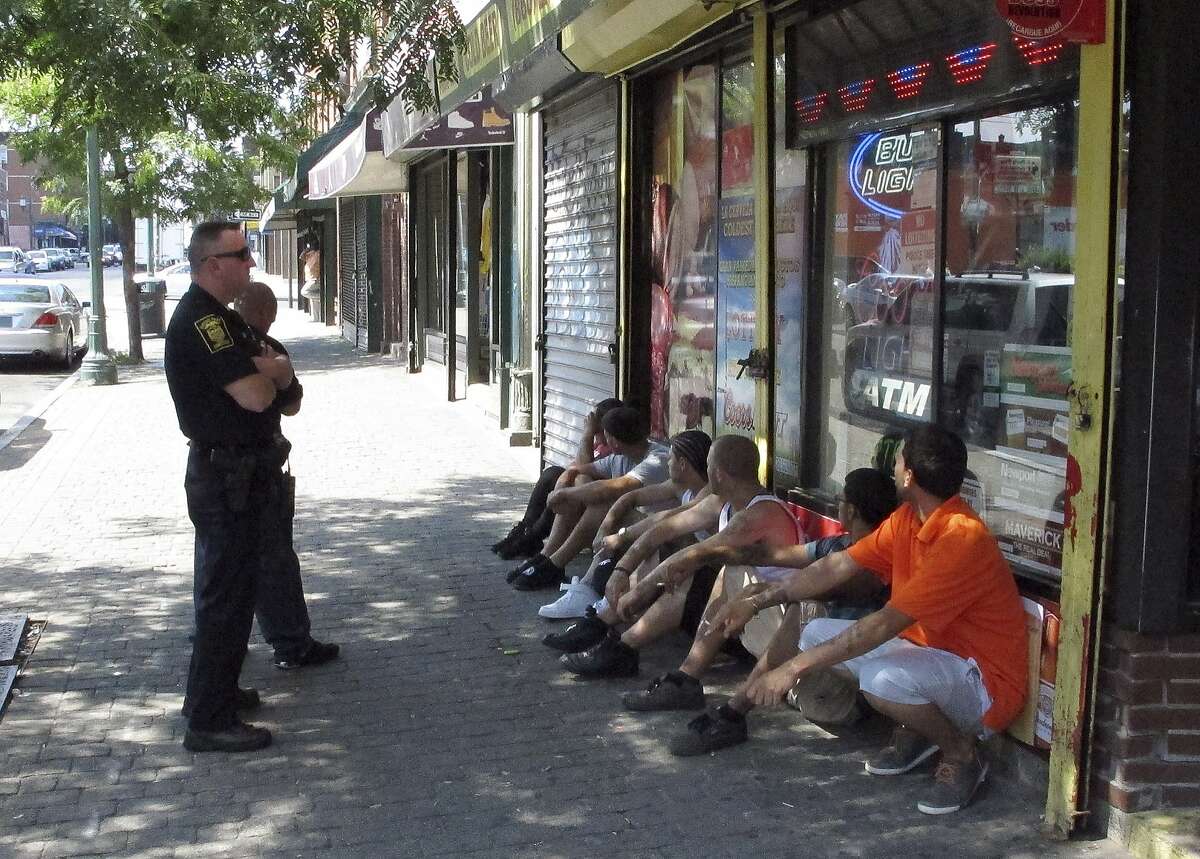 Street gangs tone down use of colors, tattoos to lower profile