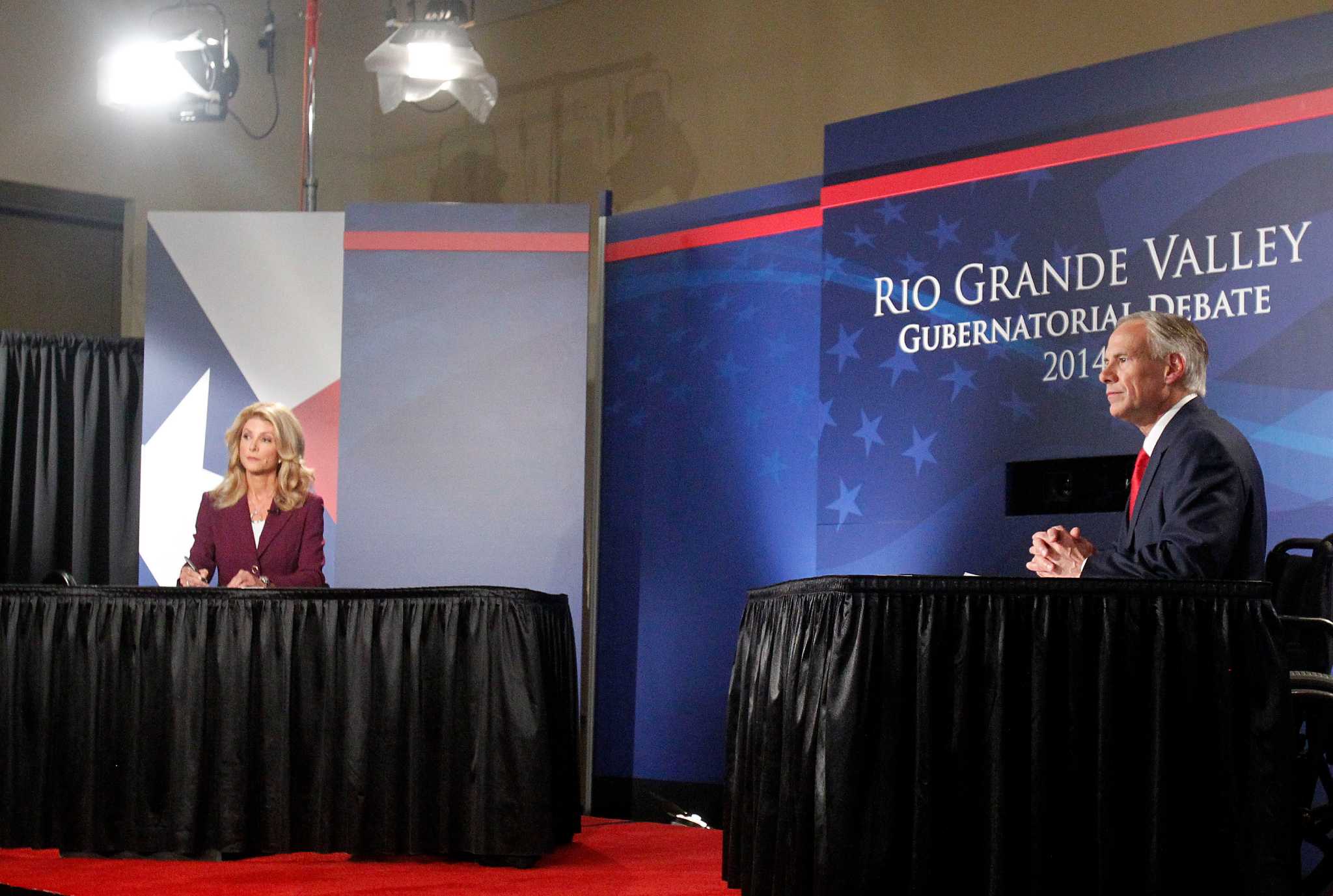 Davis, Abbott spar in debate