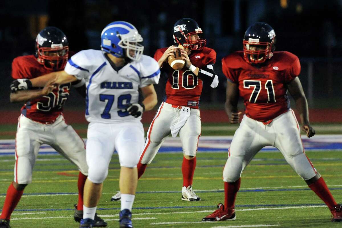 Woods does it all to power Shaker win