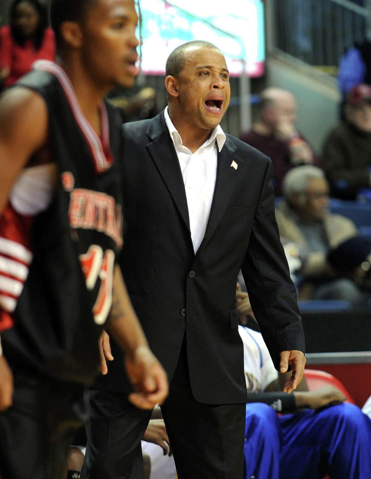 Coach charged with abandoning child