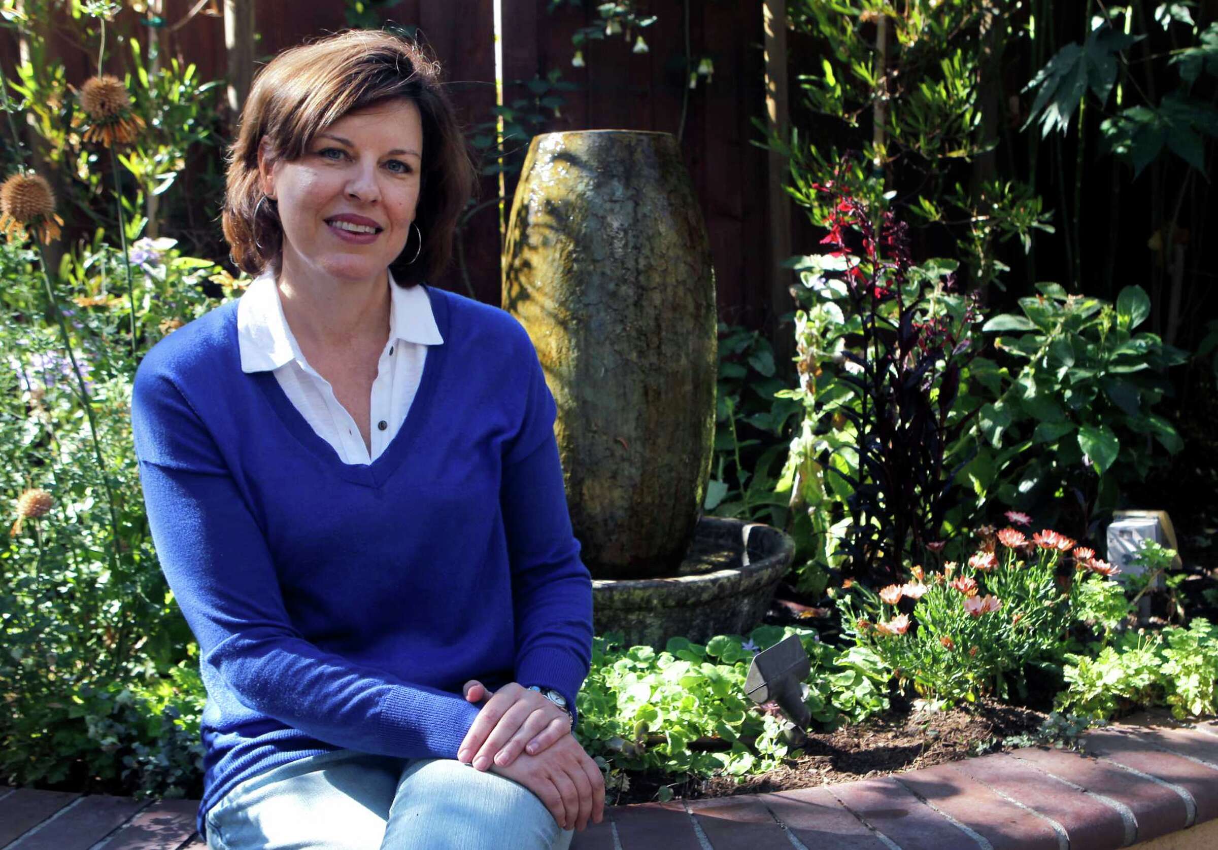 Go visionary in small yard — add art, color, personality