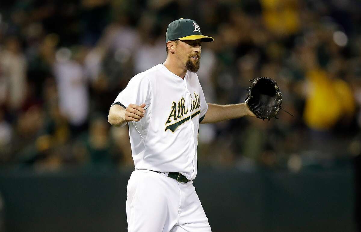 A’s open big lead, hang on to beat Angels 8-4