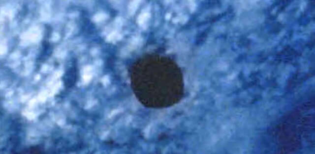 UFO lurks below ocean's surface in NASA photo, skeptics believe