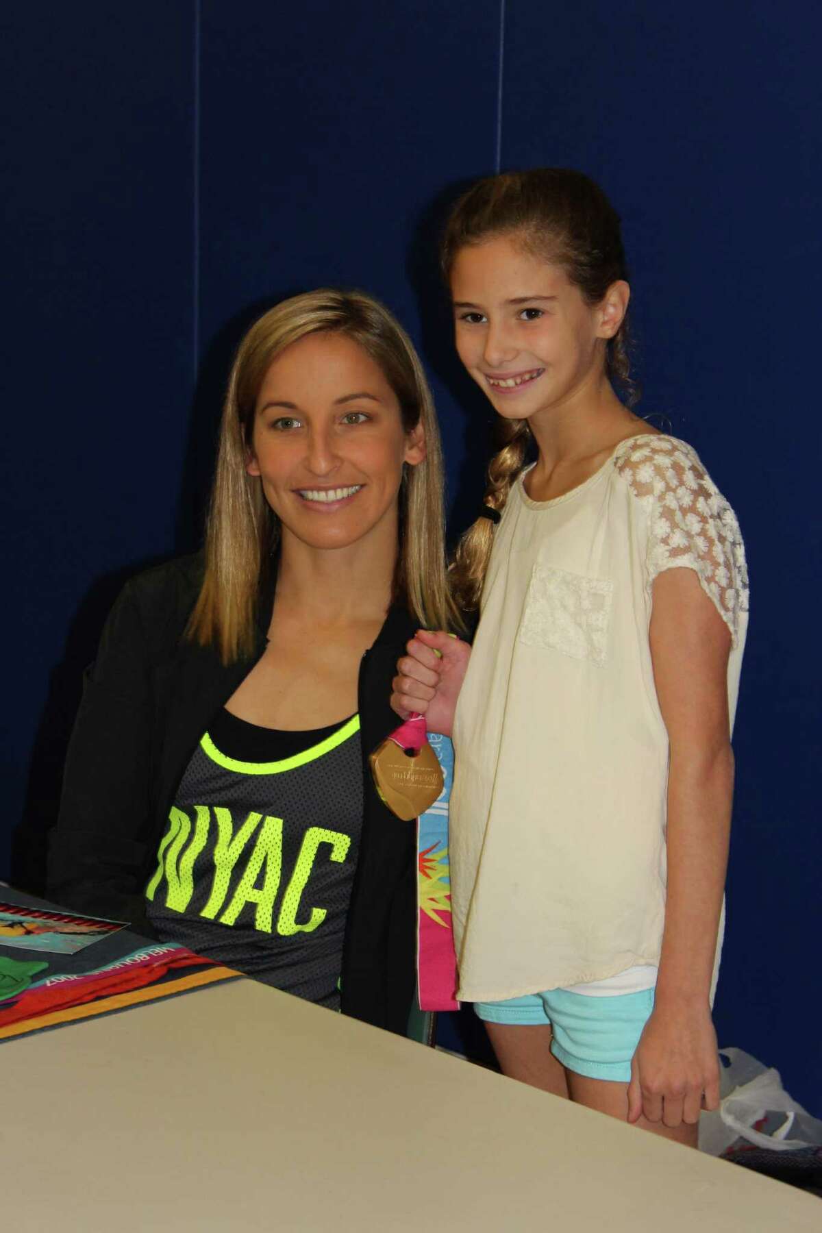 Olympic swimmer hosts clinic at Darien YMCA