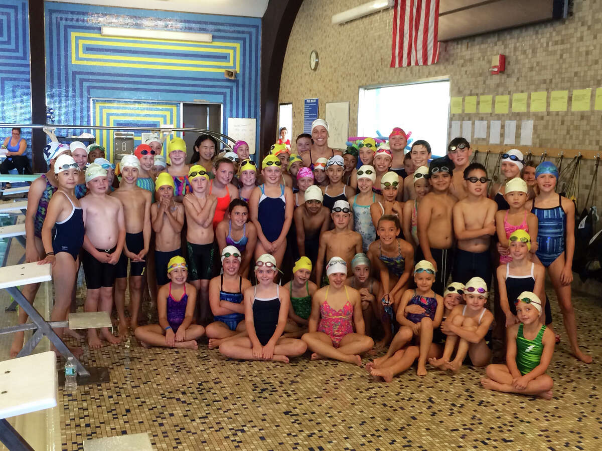 Olympic swimmer hosts clinic at Darien YMCA