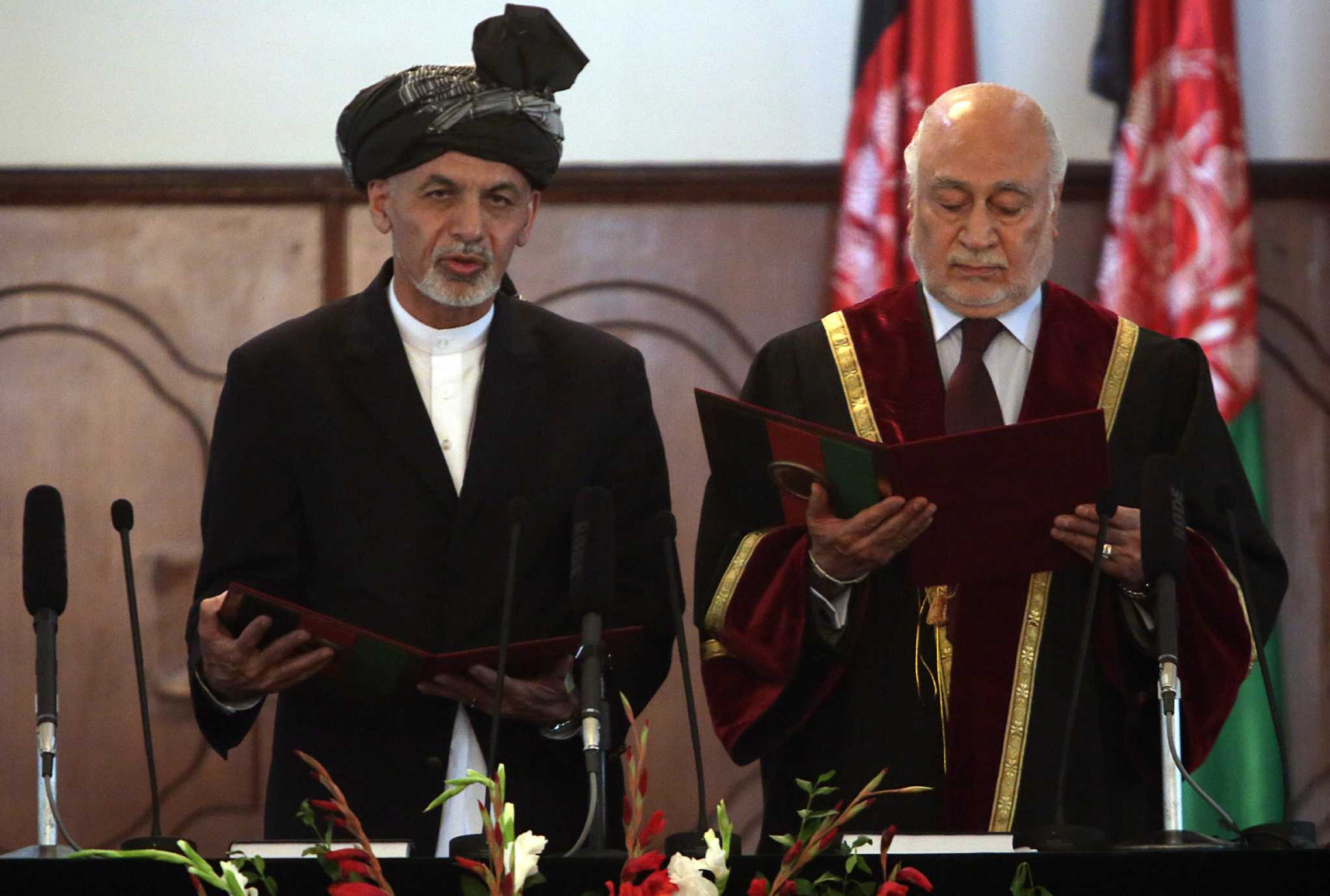 New Afghan president takes over