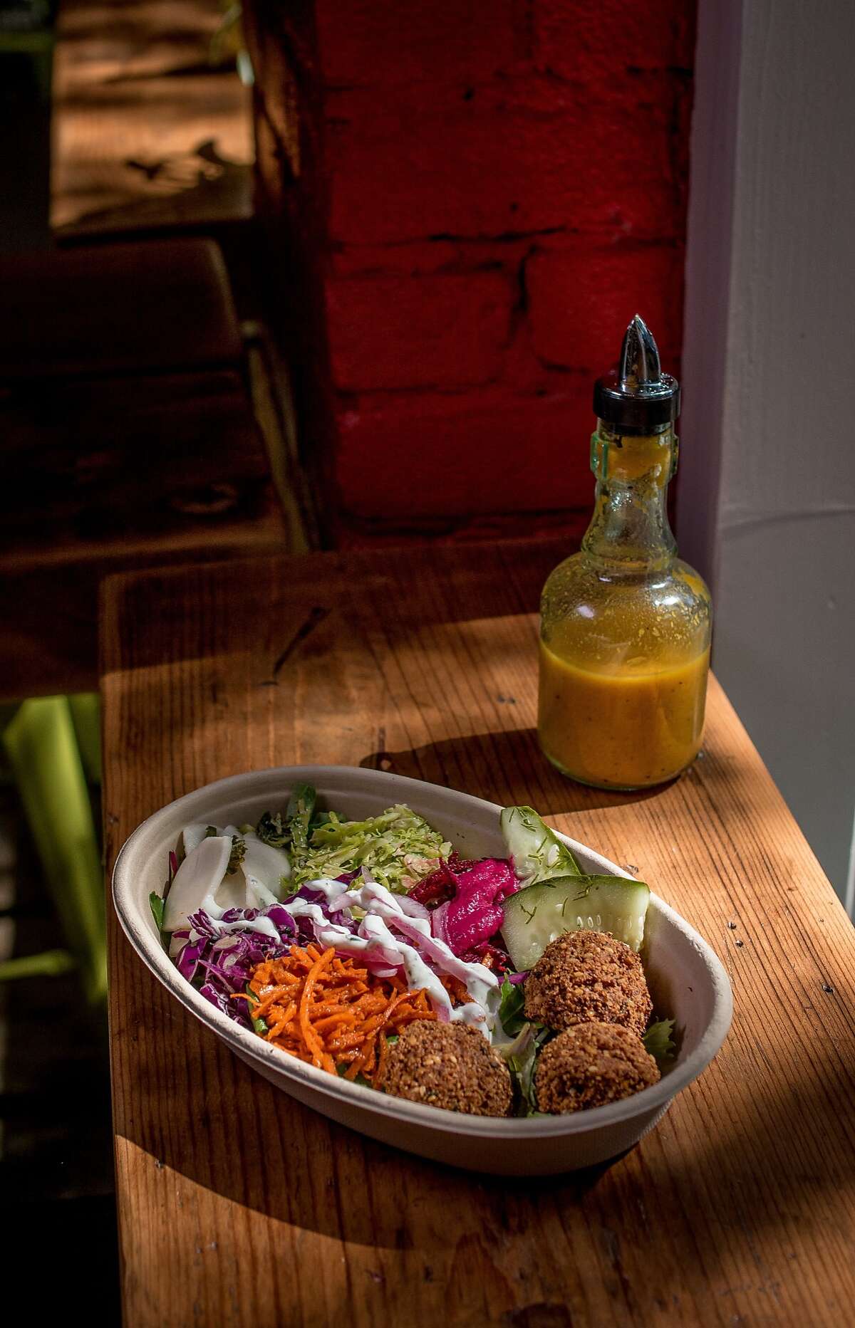 Taste the rainbow at Liba Falafel’s toppings bar