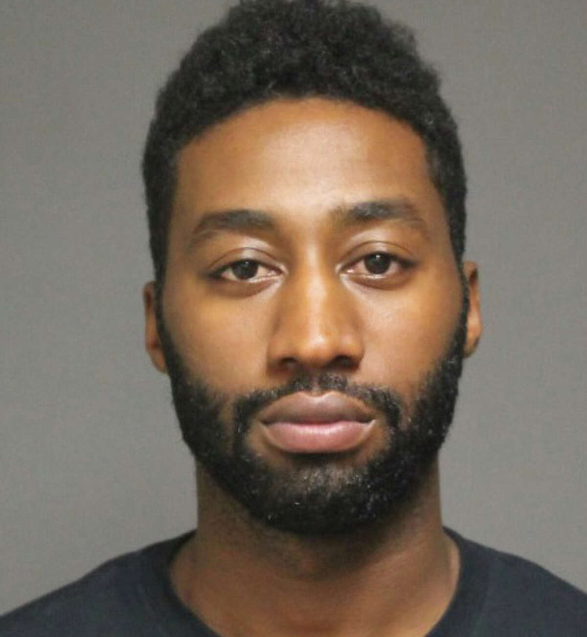 Man accused of taking laptop at photo shoot