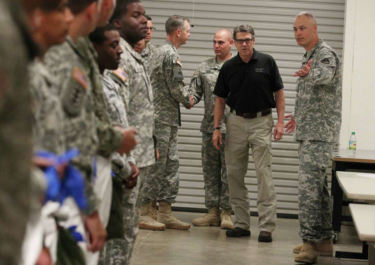 Perry visits Fort Hood troops who are deploying to Liberia