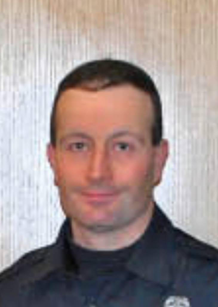 Norwalk police officer honored for saving woman from burning building