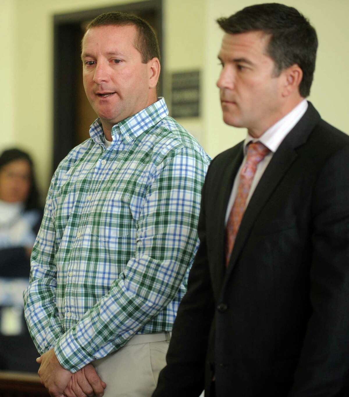 Ex-trooper gets 1 year for theft from dying motorist