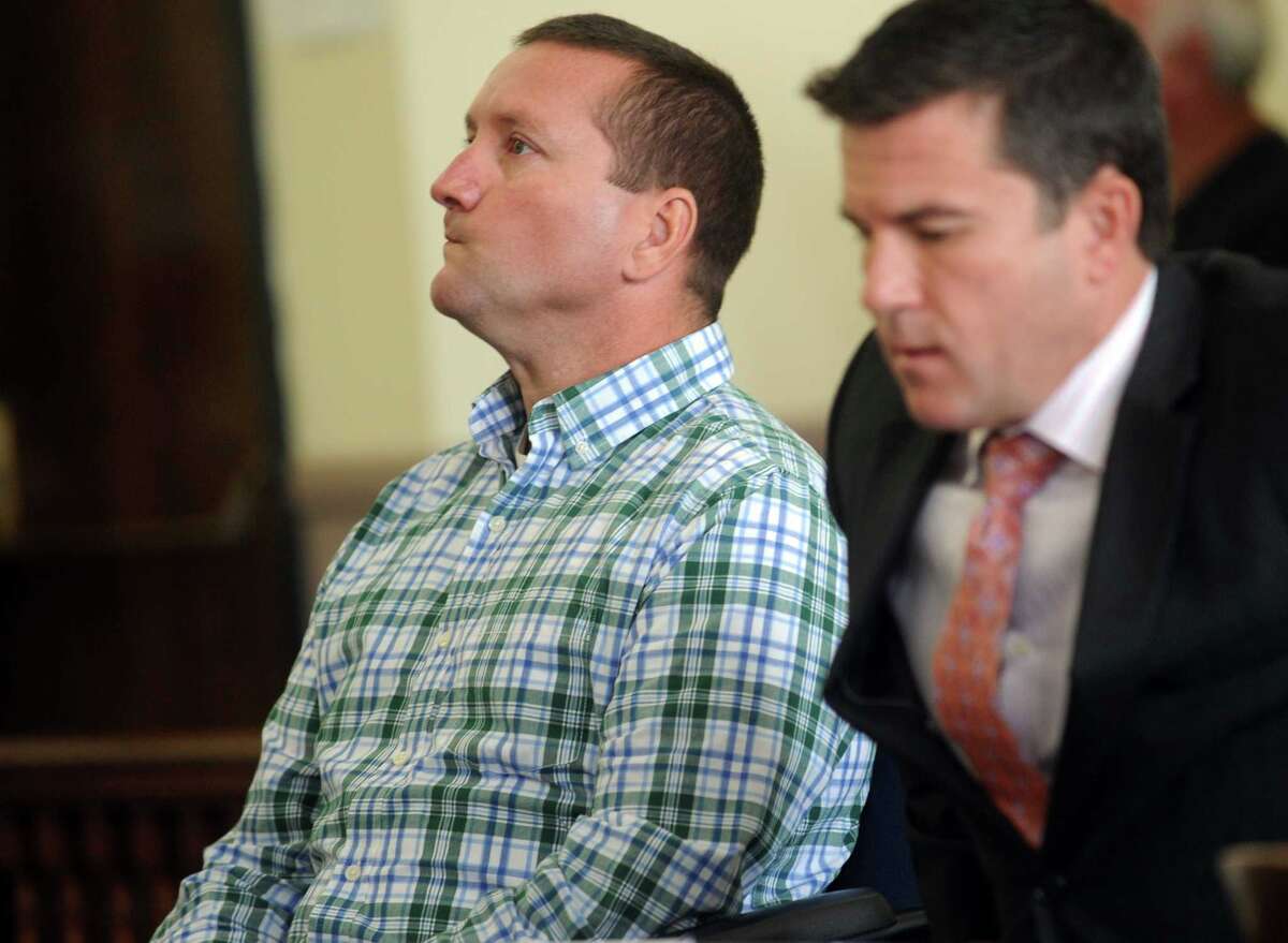 Ex-trooper gets 1 year for theft from dying motorist