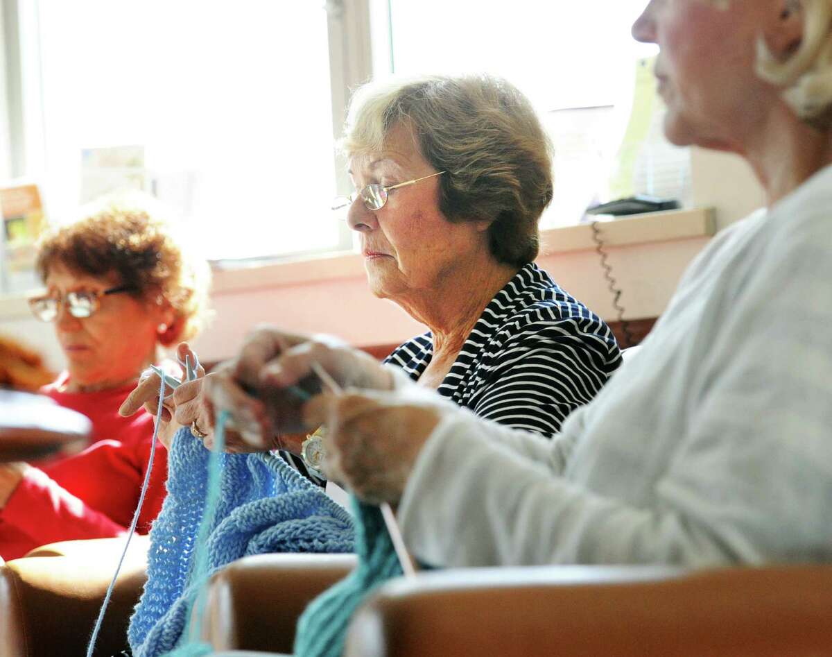 Tightly knit group makes shawls for cancer patients