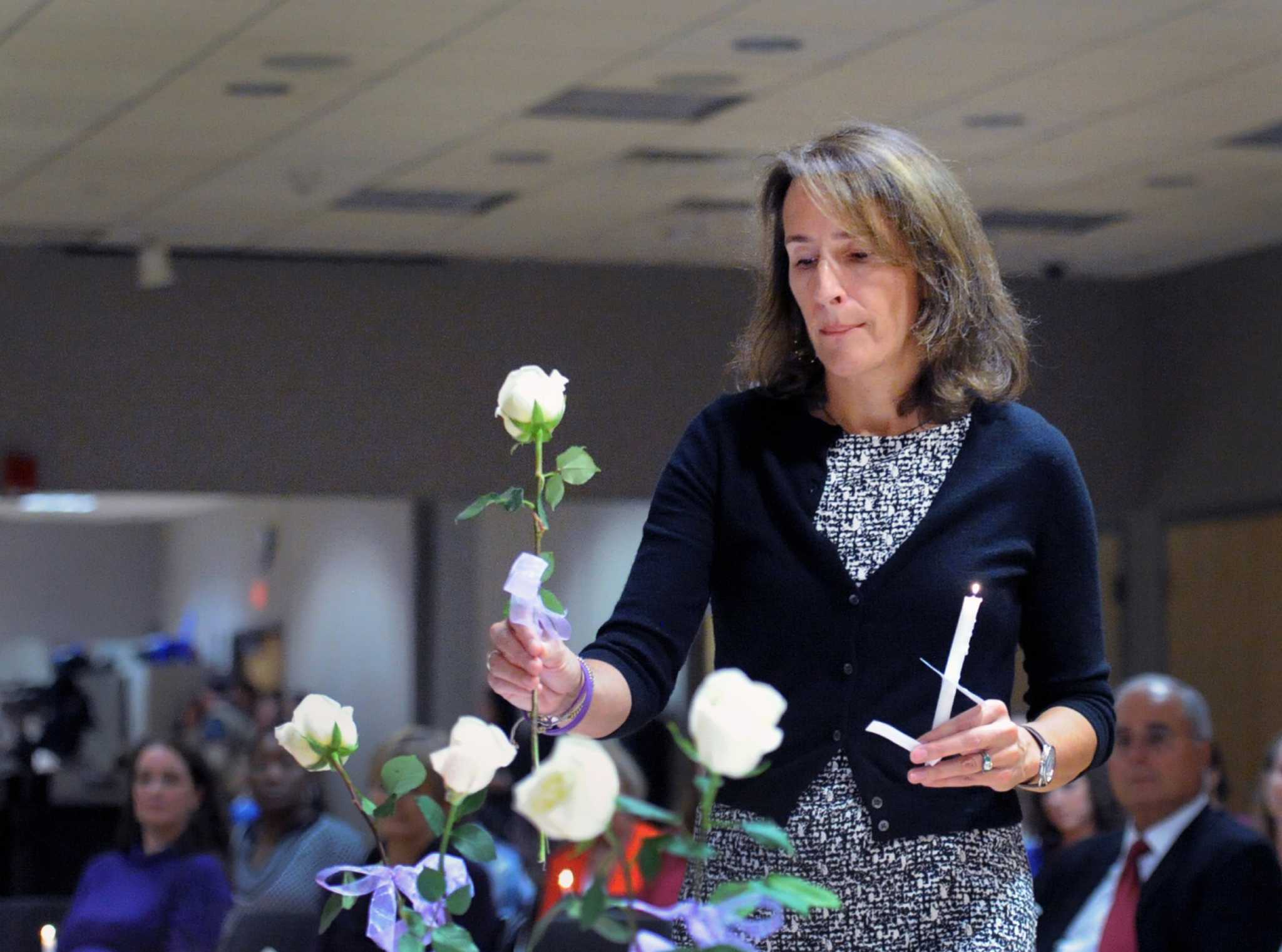 Vigil looks toward end of domestic violence