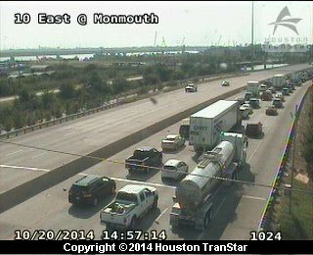 Downed power lines close I-10 in both directions in east Harris County Downed power lines close I-10 in both directions in east Harris County