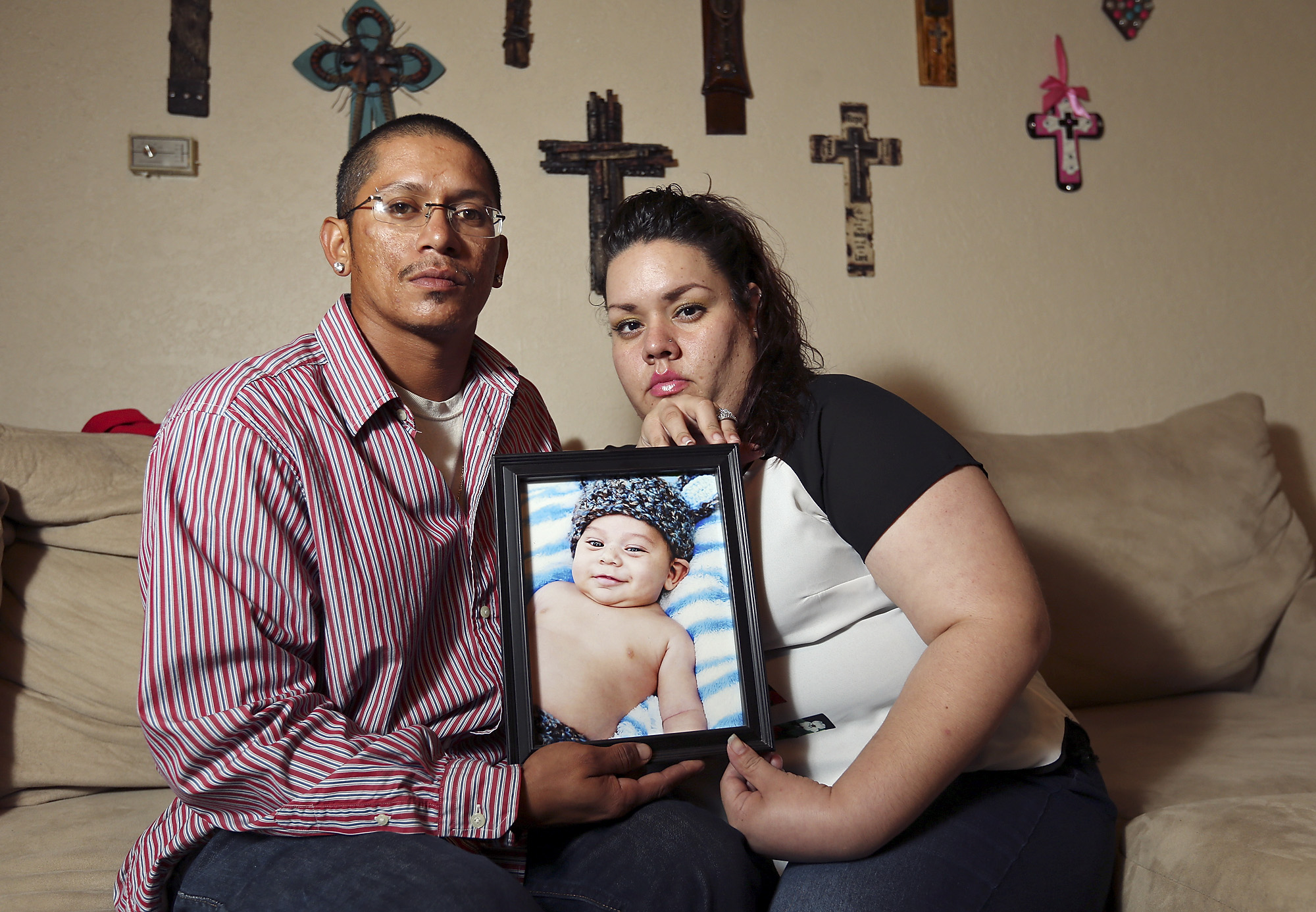 Mother fights abuse charge, blames genetic disease for son's injuries
