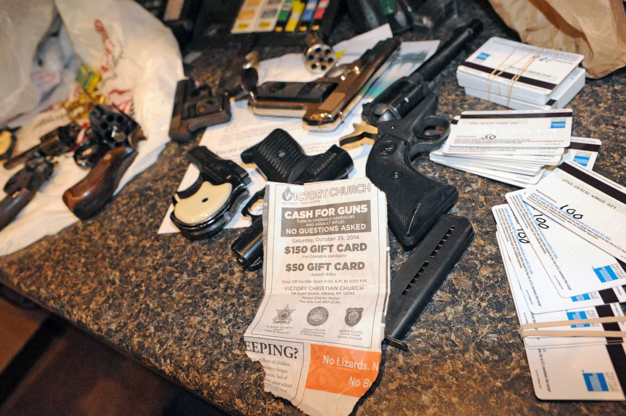 Photos: 40 firearms netted in gun buyback