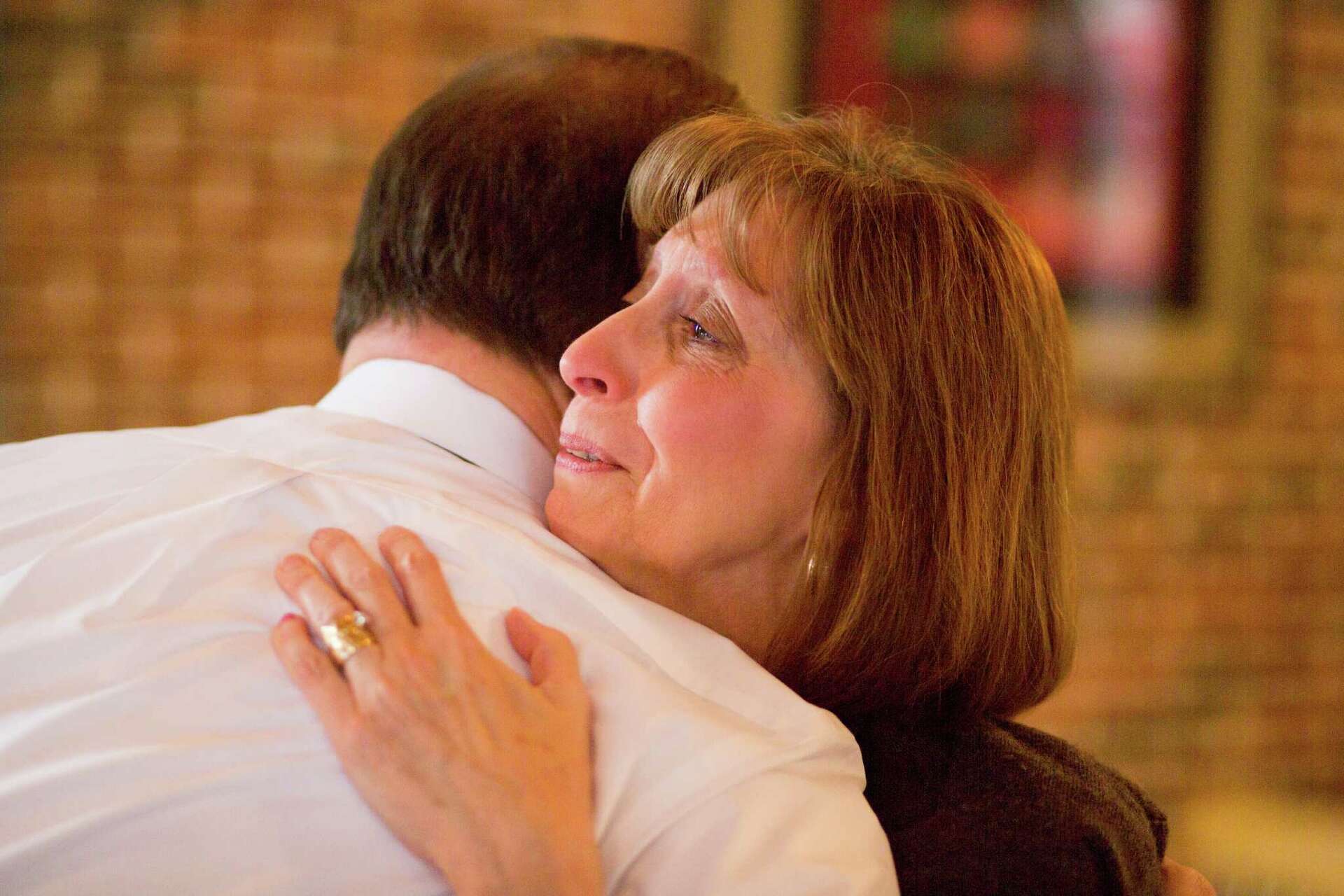 Hands of hospice workers blessed in prayerful ceremony