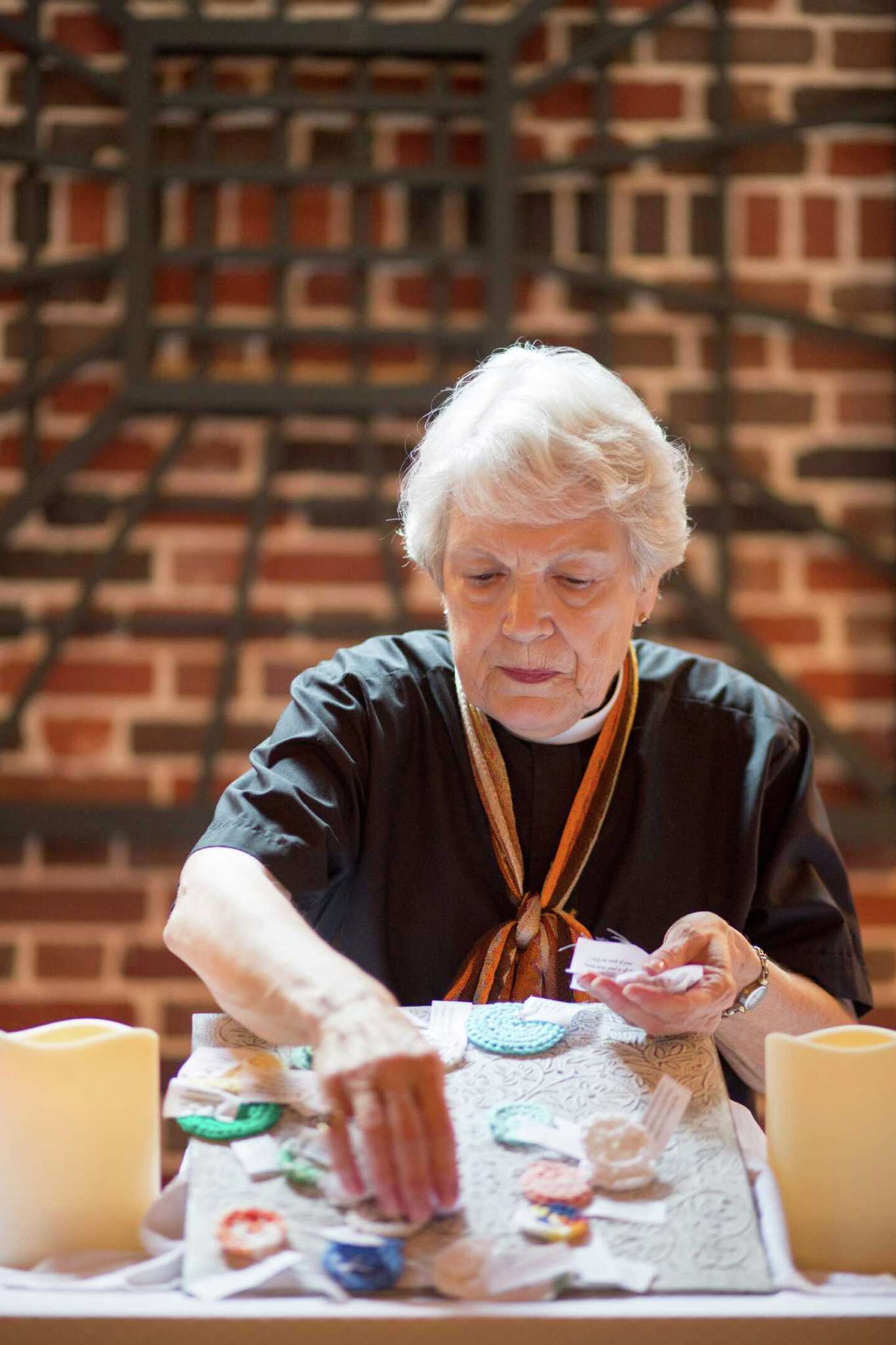 Hands of hospice workers blessed in prayerful ceremony