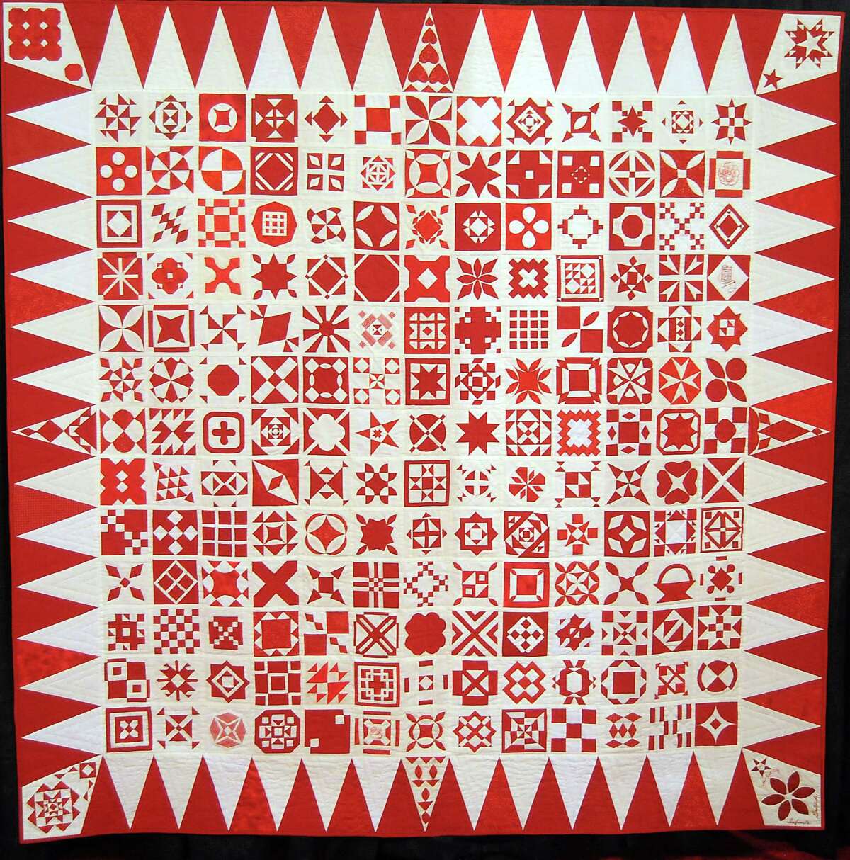 Quilt show celebrates Ruby Jubilee with red-and-white exhibit