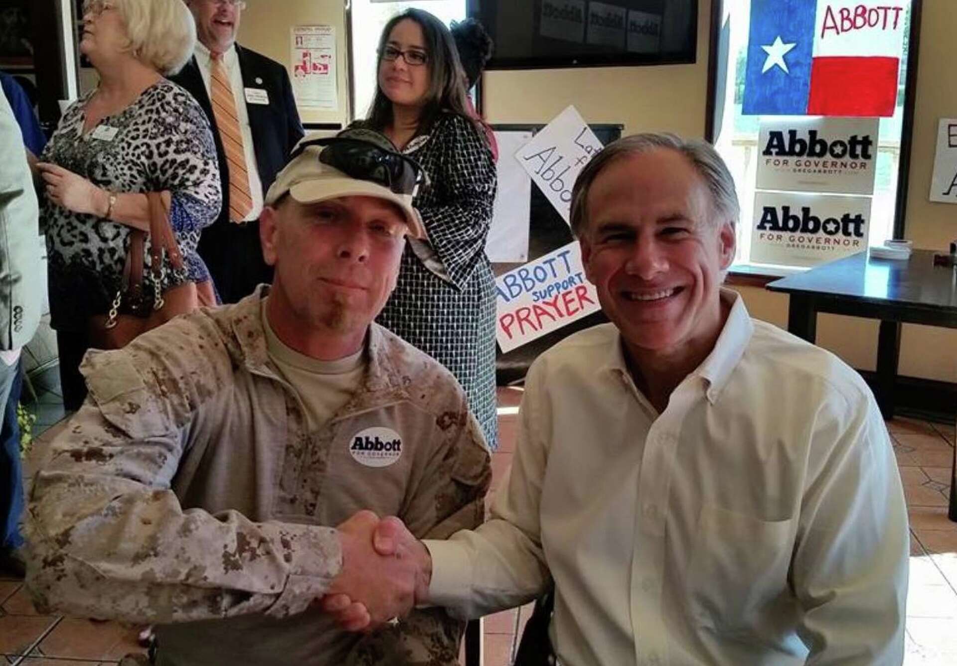 Militia leader posed with Greg Abbott four days before feds found ...