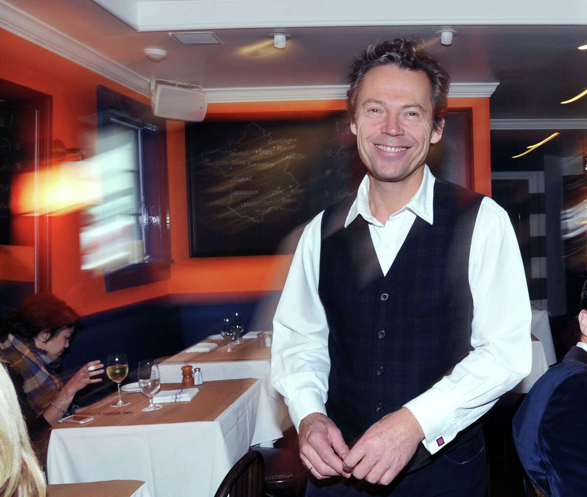 Restaurant owner shares musical side at album release concert