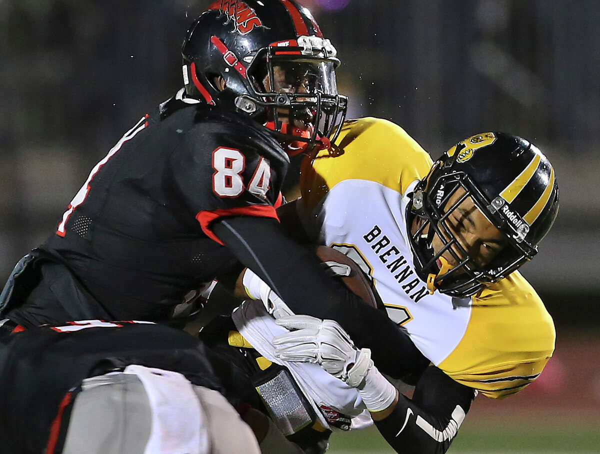 Warren's 2 TDs spark Brennan