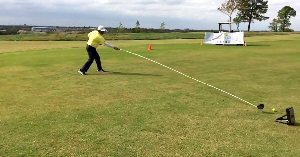Texas man swings ridiculously giant golf club for a world record