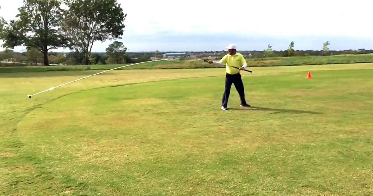 Texas man swings ridiculously giant golf club for a world record