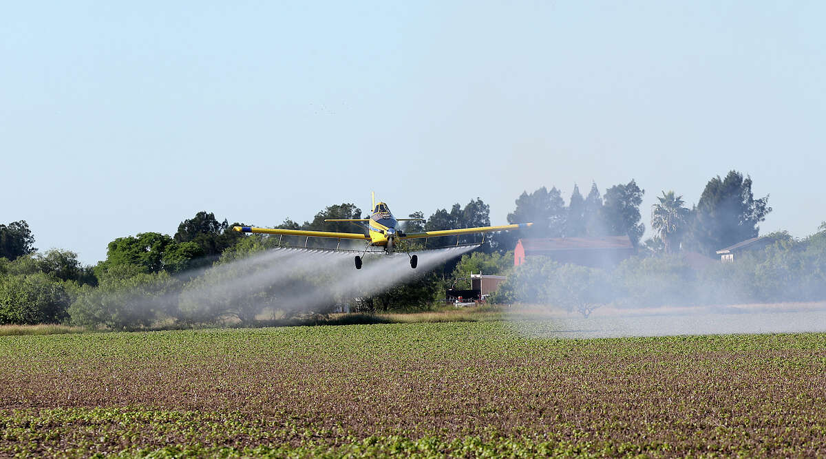 Wind towers catching crop dusters off guard
