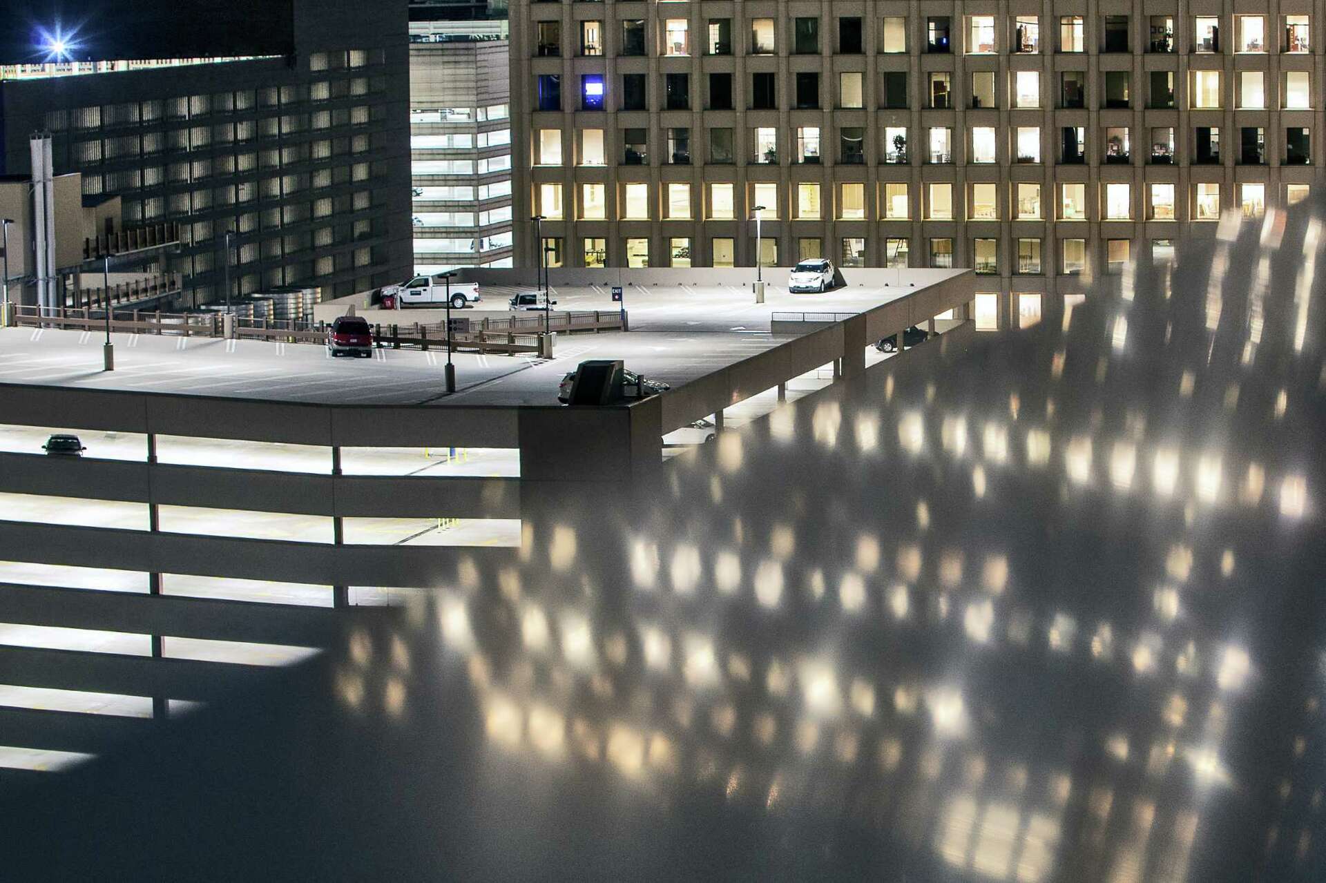 Night. Two photographers. A city of rooftops and unlocked doors.