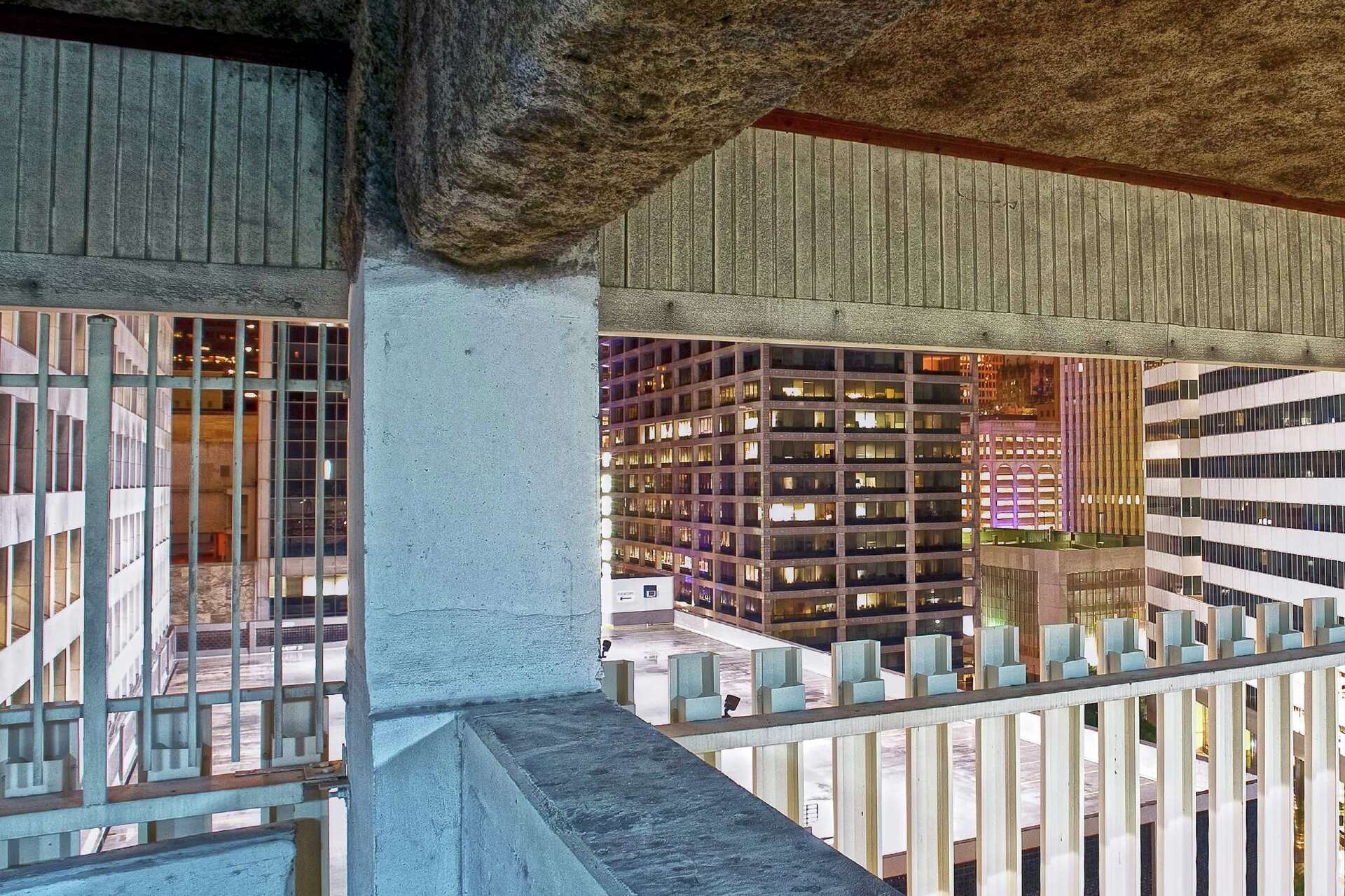 Night. Two photographers. A city of rooftops and unlocked doors.