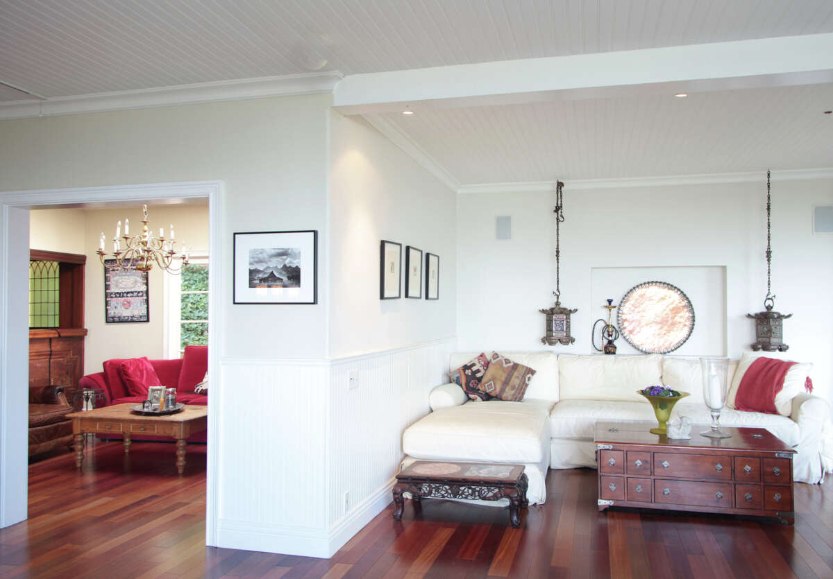 Covered veranda with bay views highlights Cape Cod-style home in Sausalito