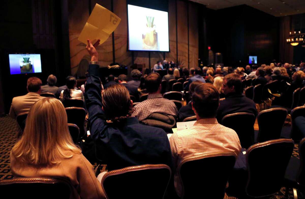 Bucks for the memories: Petroleum Club auctions off some of its relics