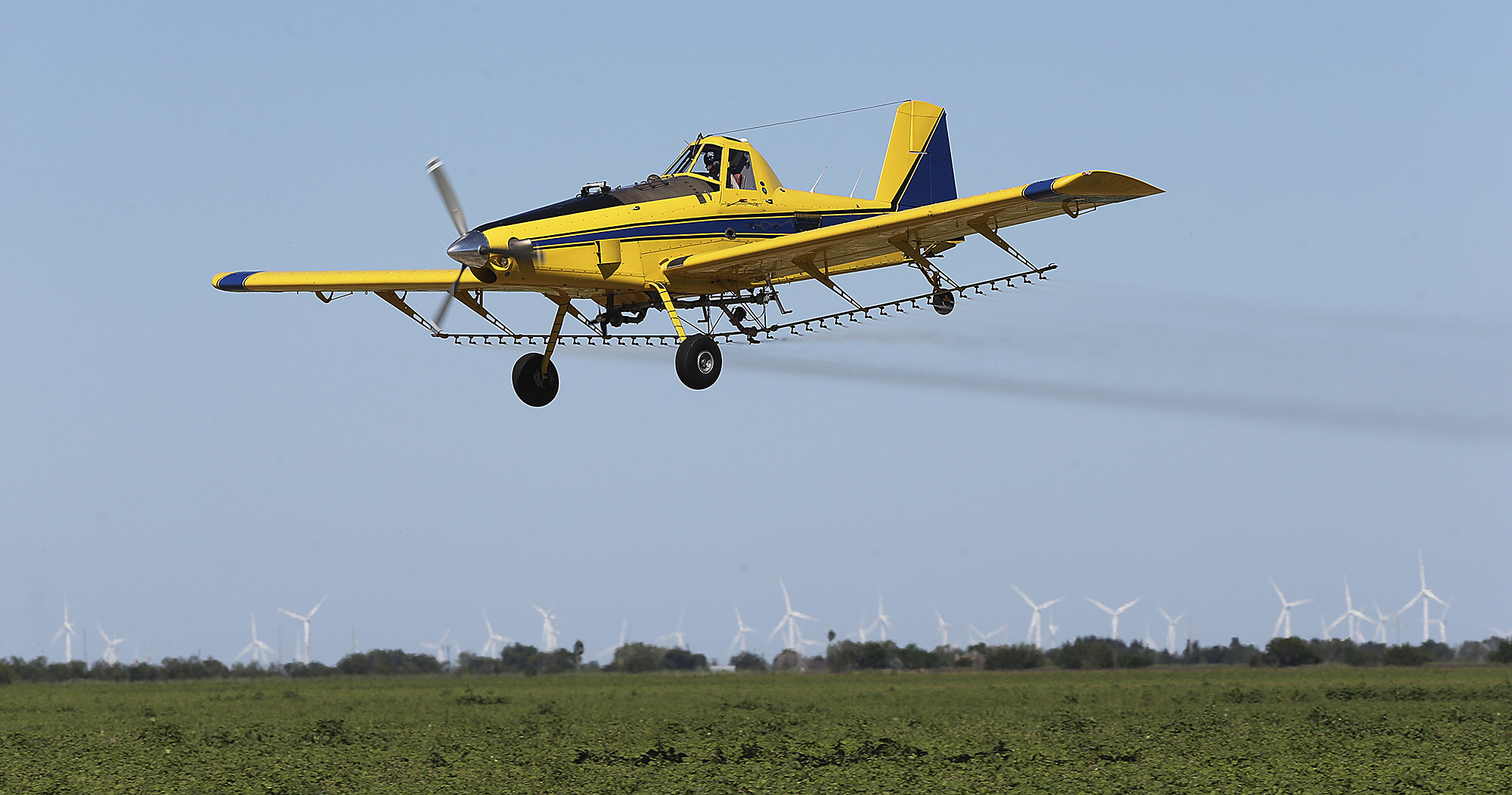 Wind towers catching crop dusters off guard