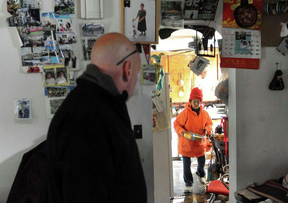 Elderly woman pulled from burning Bridgeport house