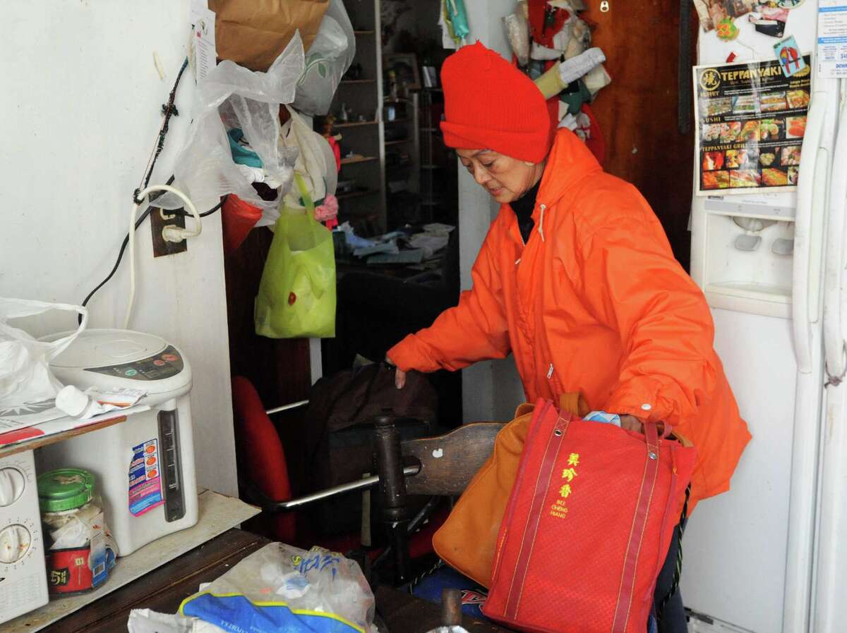 Elderly woman pulled from burning Bridgeport house