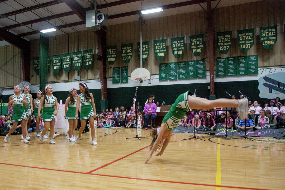 Middle school pep rally honors teacher's cancer battle