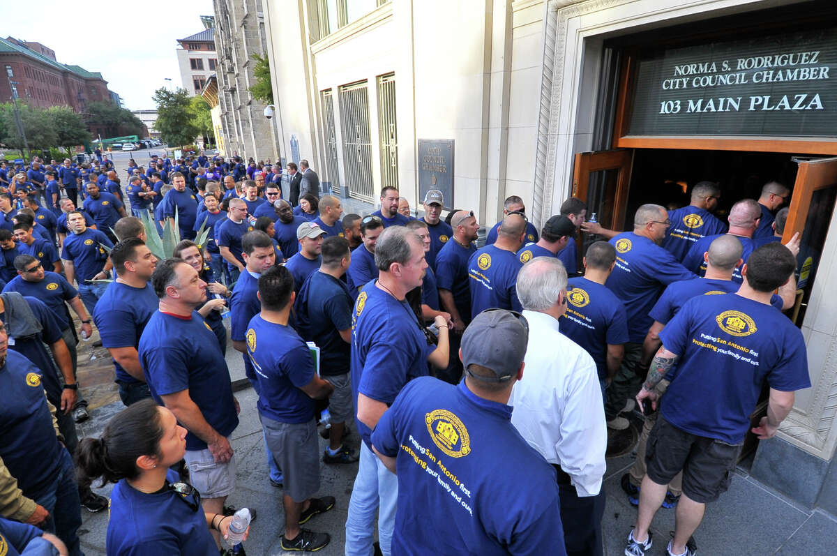 Some council members want to end suit with police, fire unions