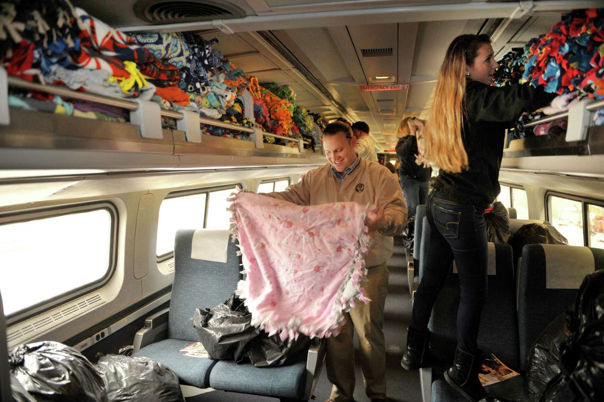 Volunteers fill Toys for Tots Train