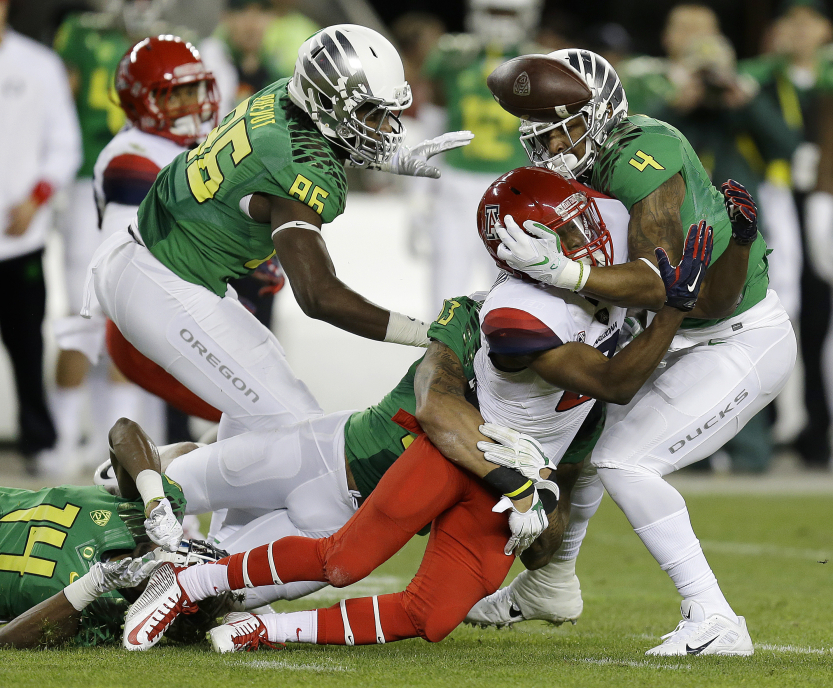 Oregon wins Pac-12 title, assures place in football playoff
