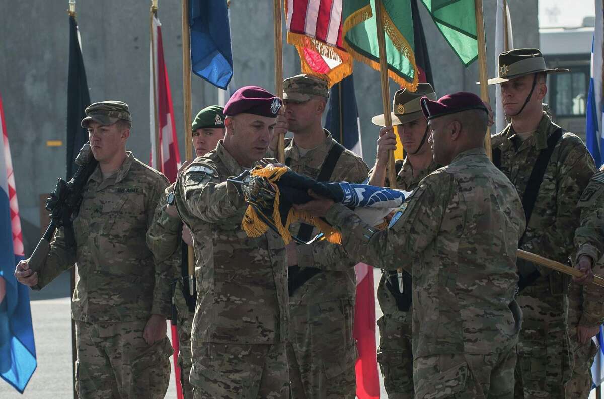 U.S., NATO end Afghan combat command after 13 years