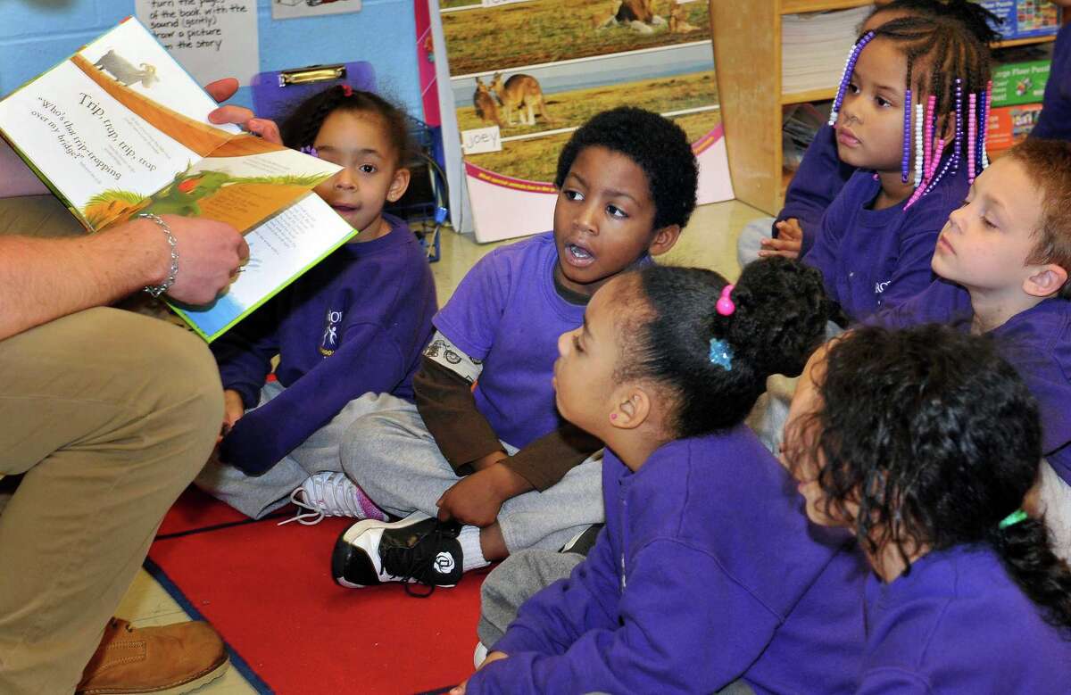 Photos: RPI fraternity delivers toys to students