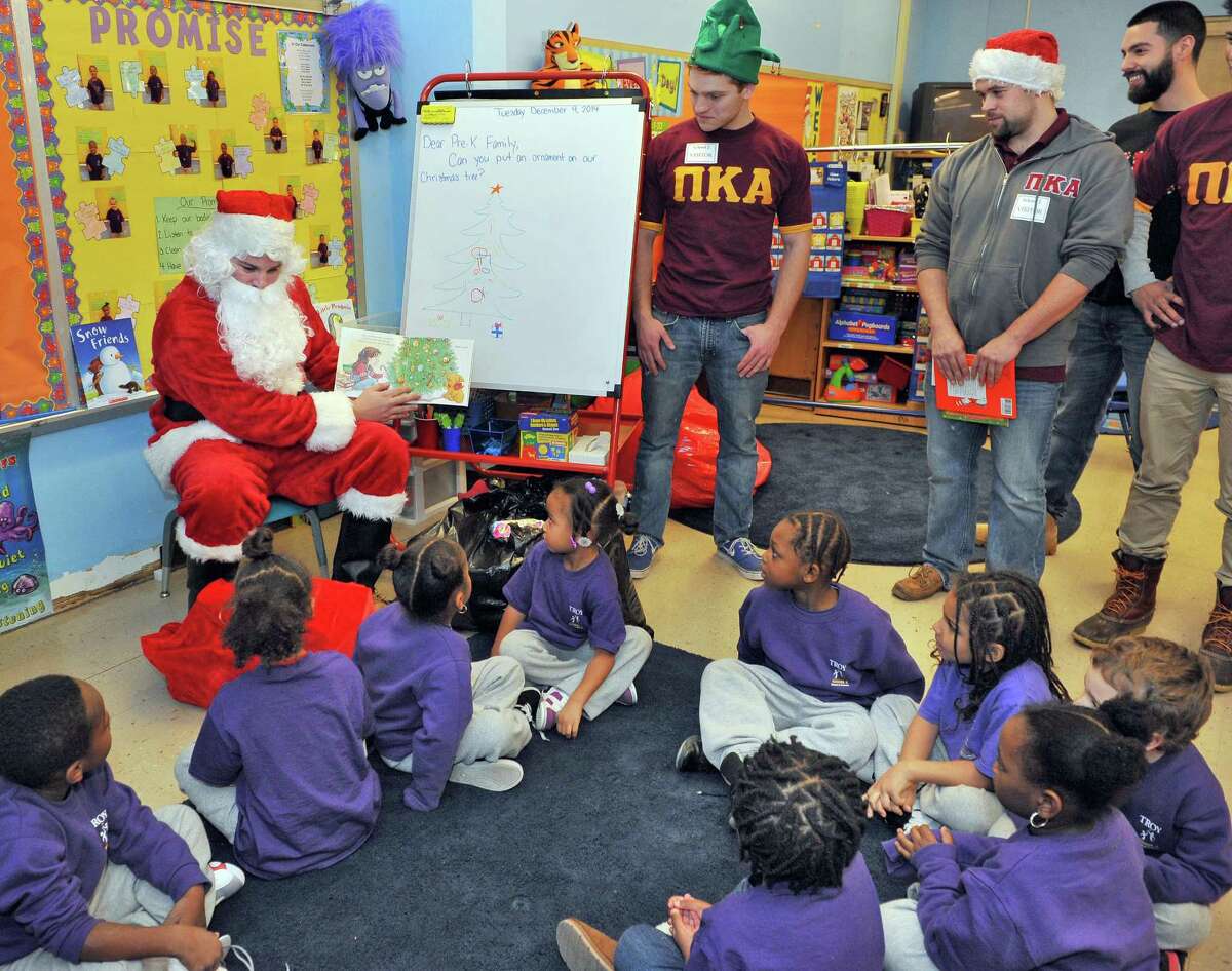 Photos: RPI fraternity delivers toys to students