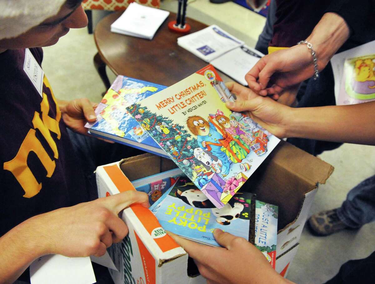 Photos: RPI fraternity delivers toys to students