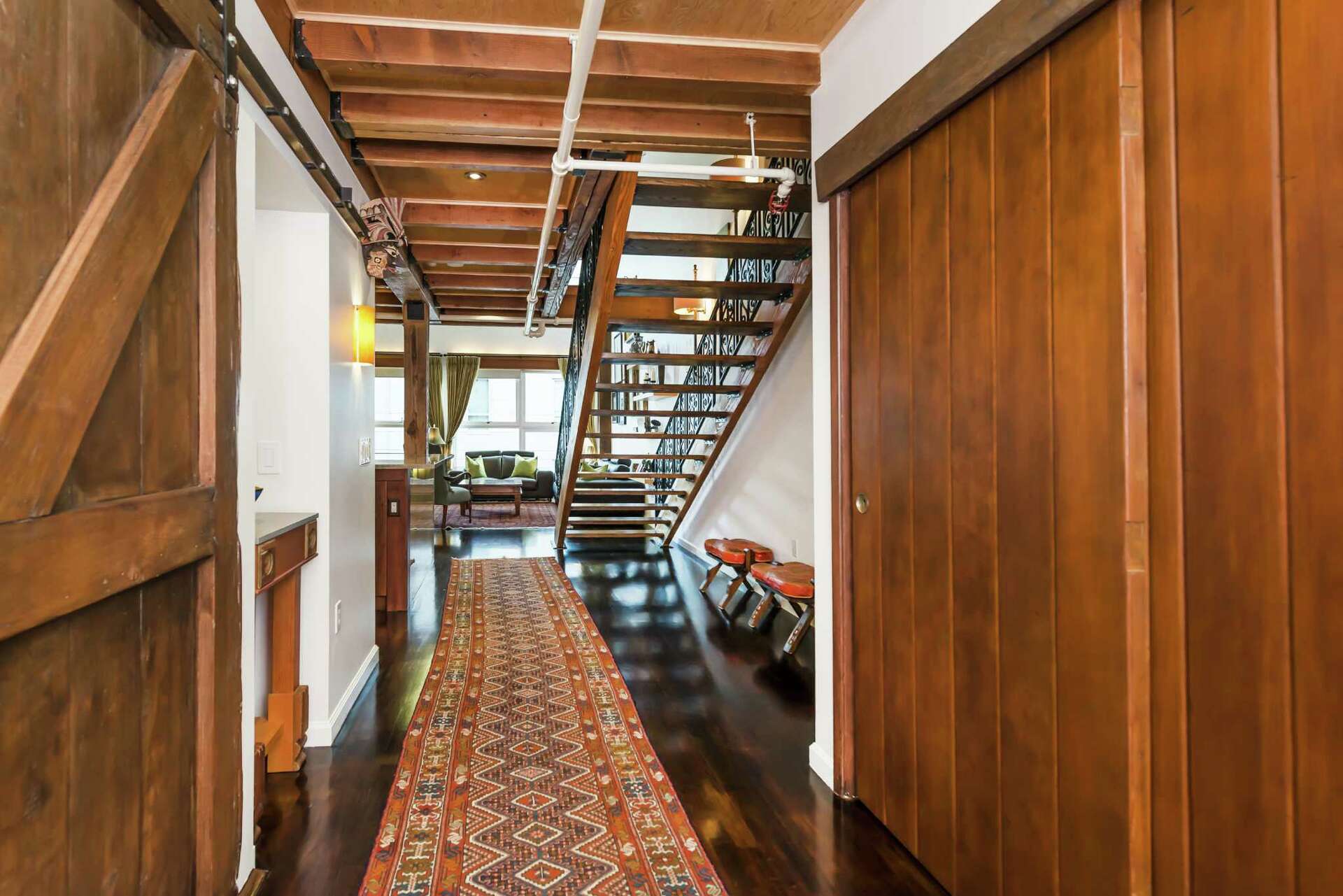 Warm finishes dominate two-bedroom loft in South Beach